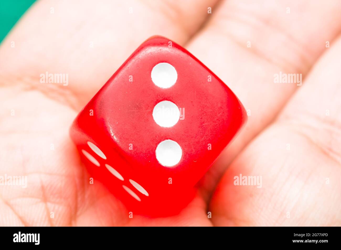 On hand red dice hi-res stock photography and images - Alamy