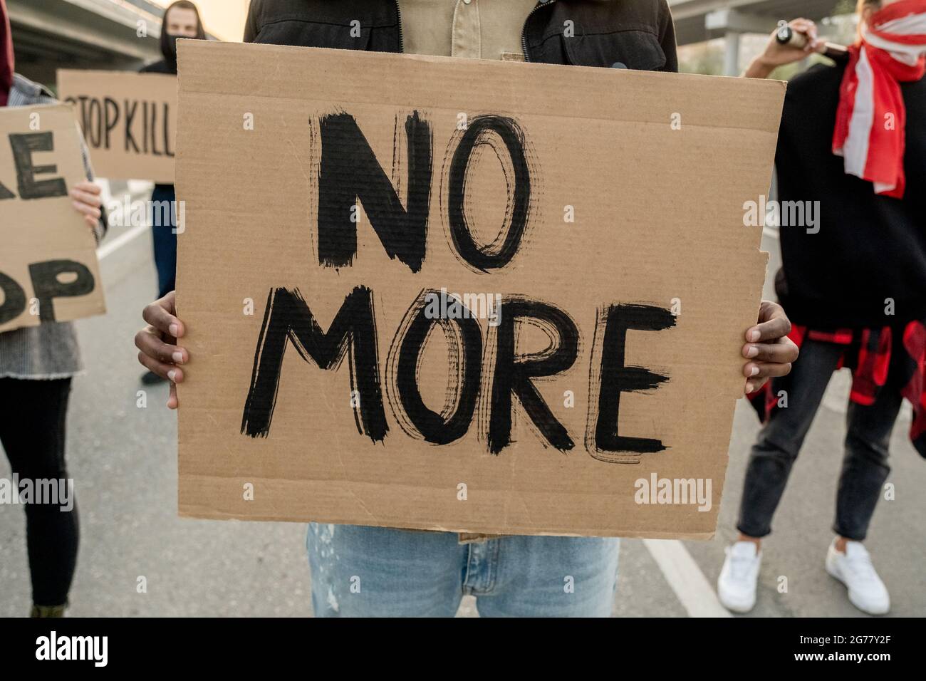 Crowd standing holding placard text social issues hi-res stock ...