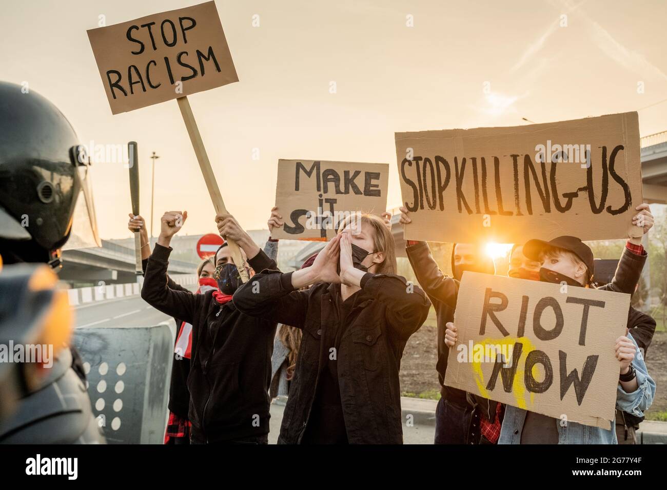 Group women holding sign hi-res stock photography and images - Alamy
