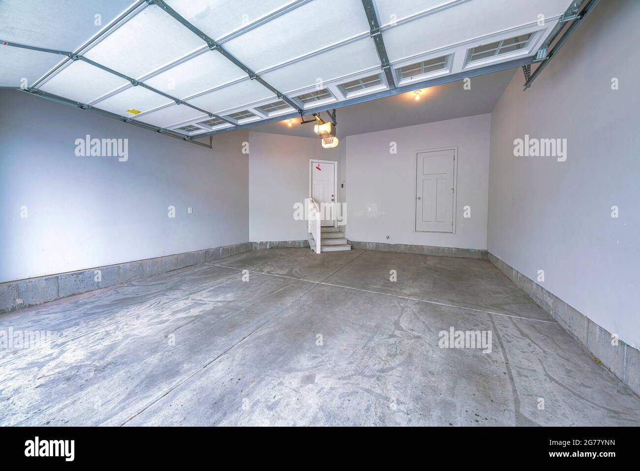 Empty interior of a white garage with no people or items Stock Photo ...