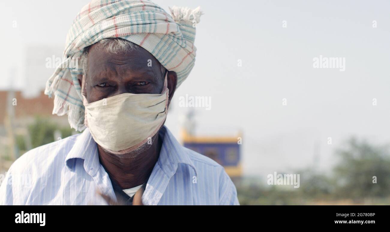 Old Indian man wearing a face mask- new normal concept Stock Photo - Alamy