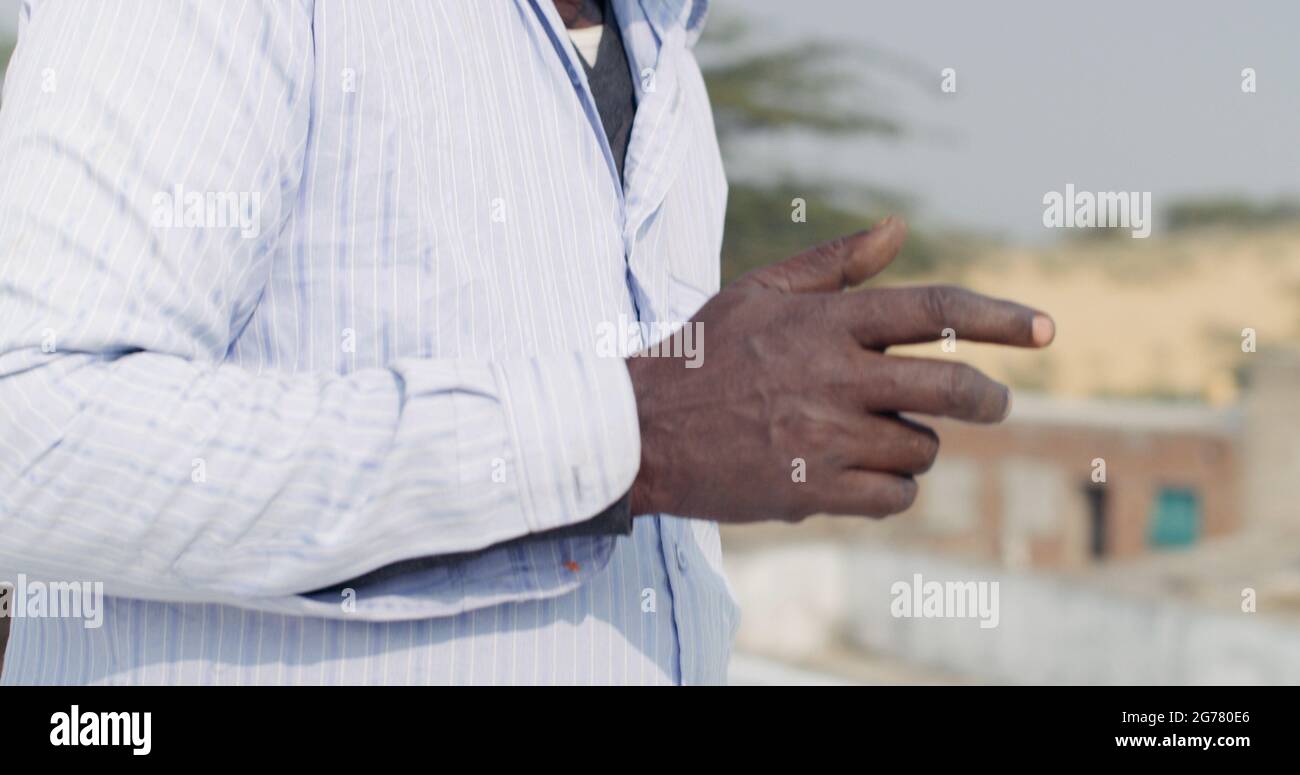 Shallow focus of an Indian mans hand gesture Stock Photo - Alamy