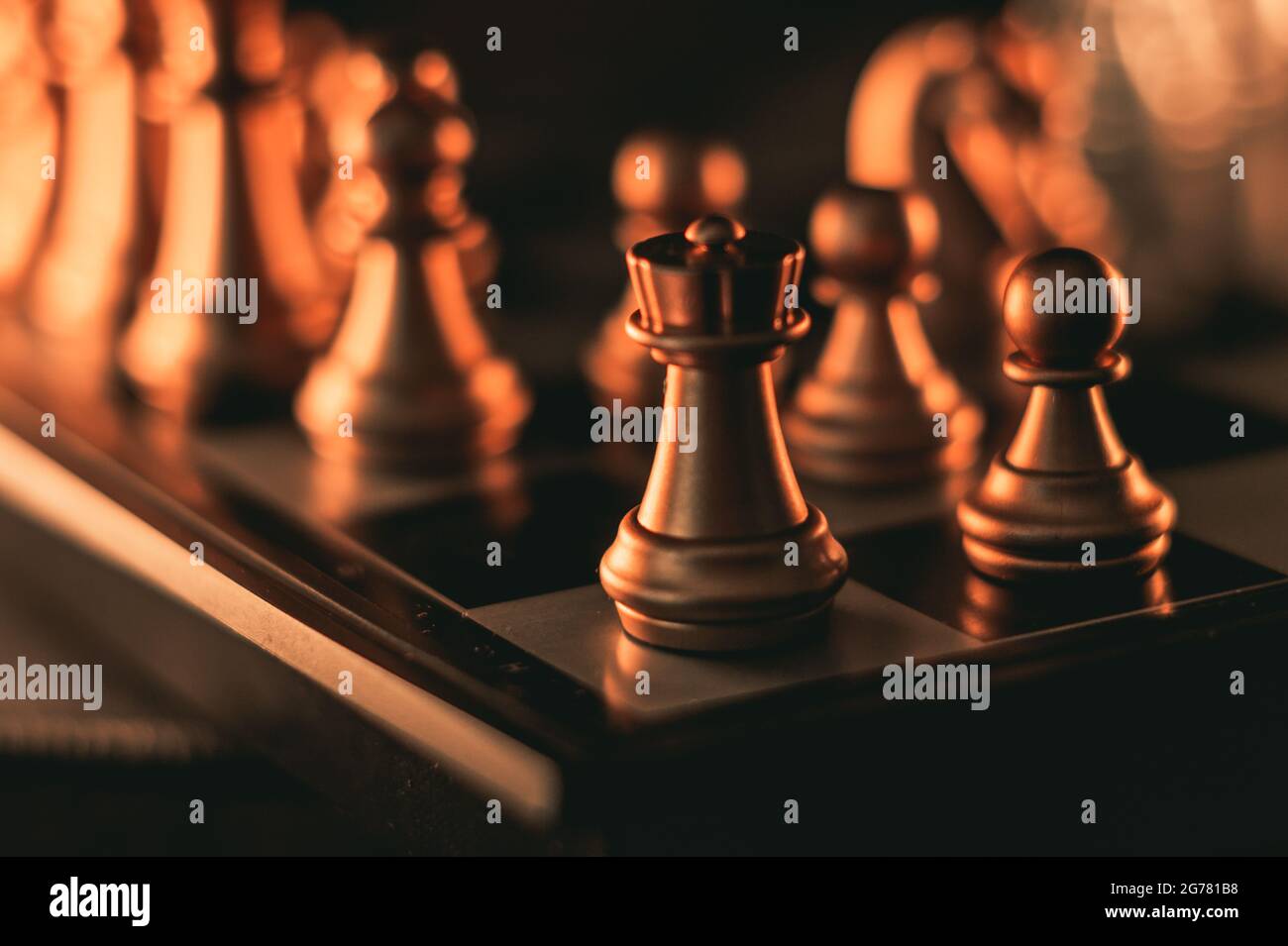 Chess pieces on a chessboard Stock Photo - Alamy