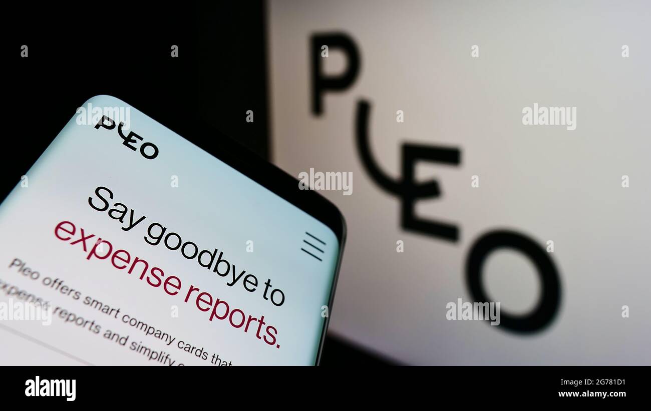 Smartphone with website of Danish fintech company Pleo Technologies on ...
