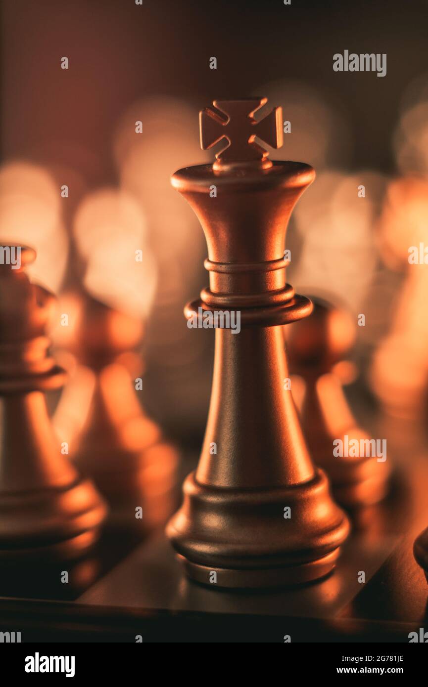 Black king on a chess board Stock Photo - Alamy