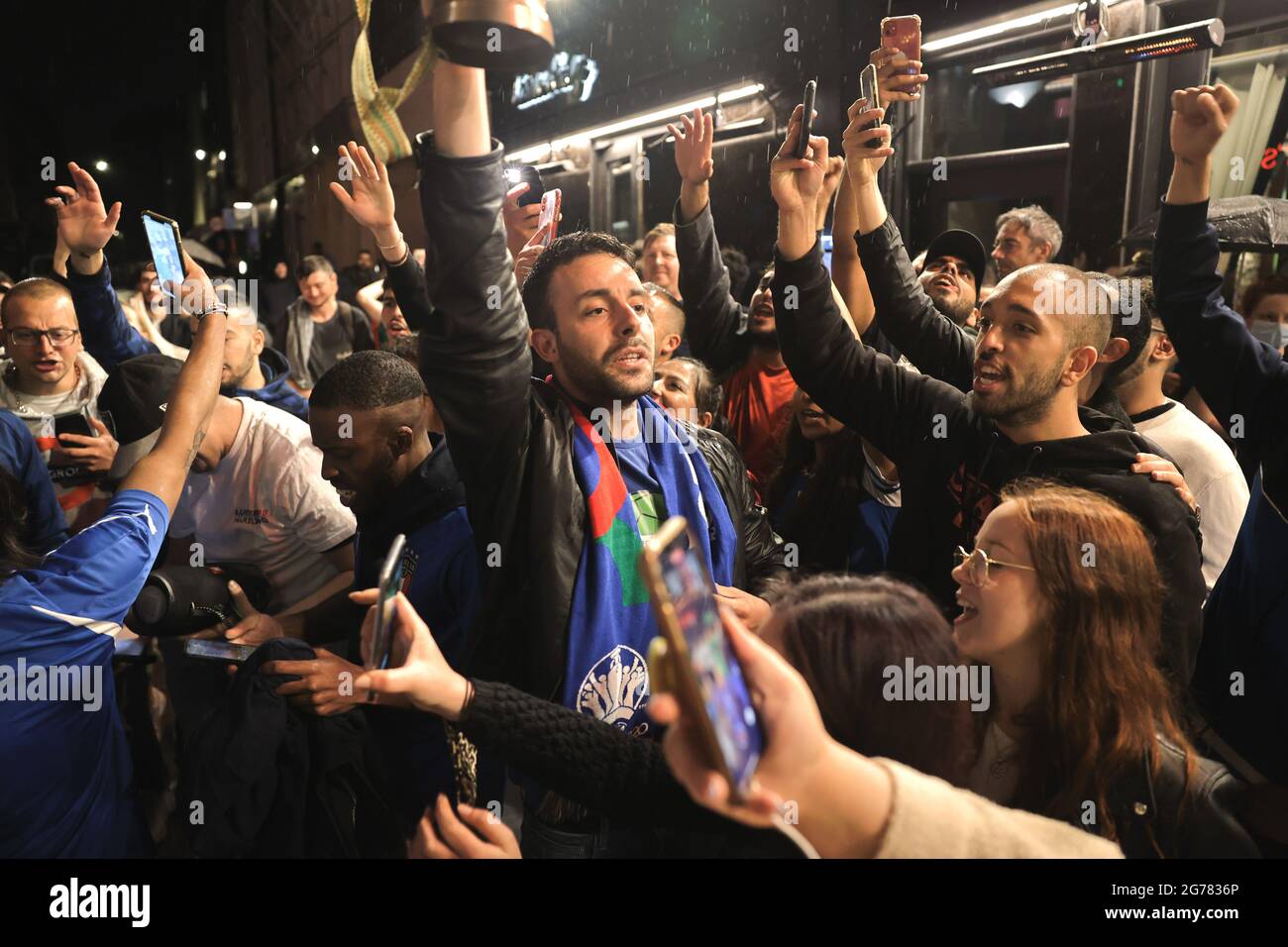 Crowds of Italy fans celebrate their victory after the final match of ...