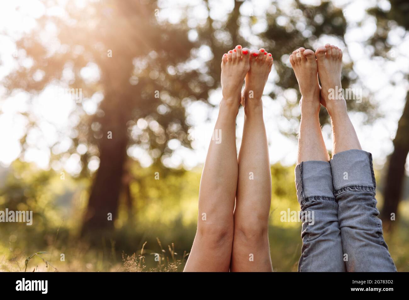 Man lifting up woman feet hi-res stock photography and images - Alamy