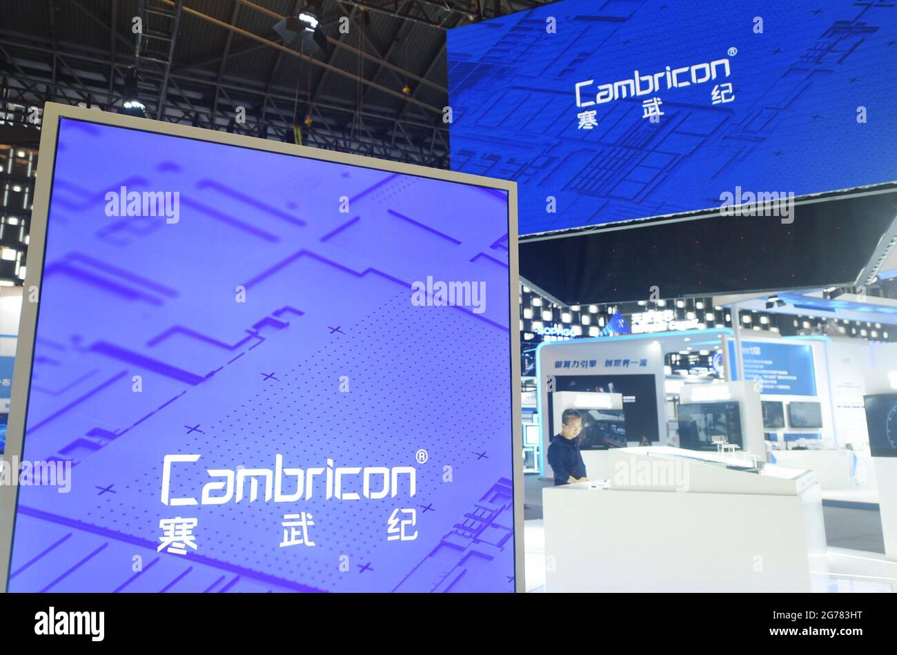 SHANGHAI, CHINA - JULY 7, 2021 - Visitors look at a series of AI chips developed by Cambrian at ...