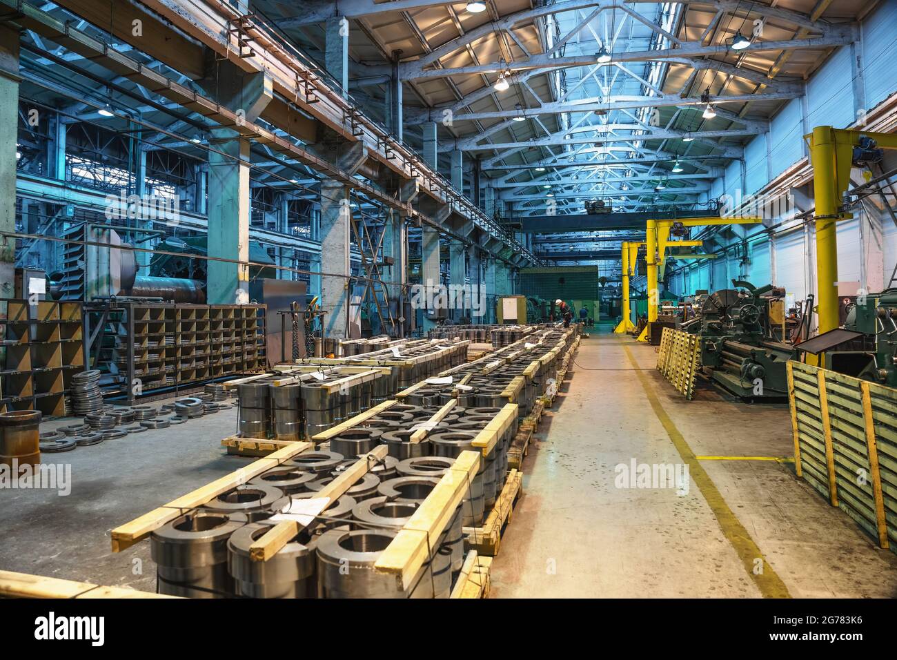 Workshop with finished metal products in metallurgical plant, lot of ...