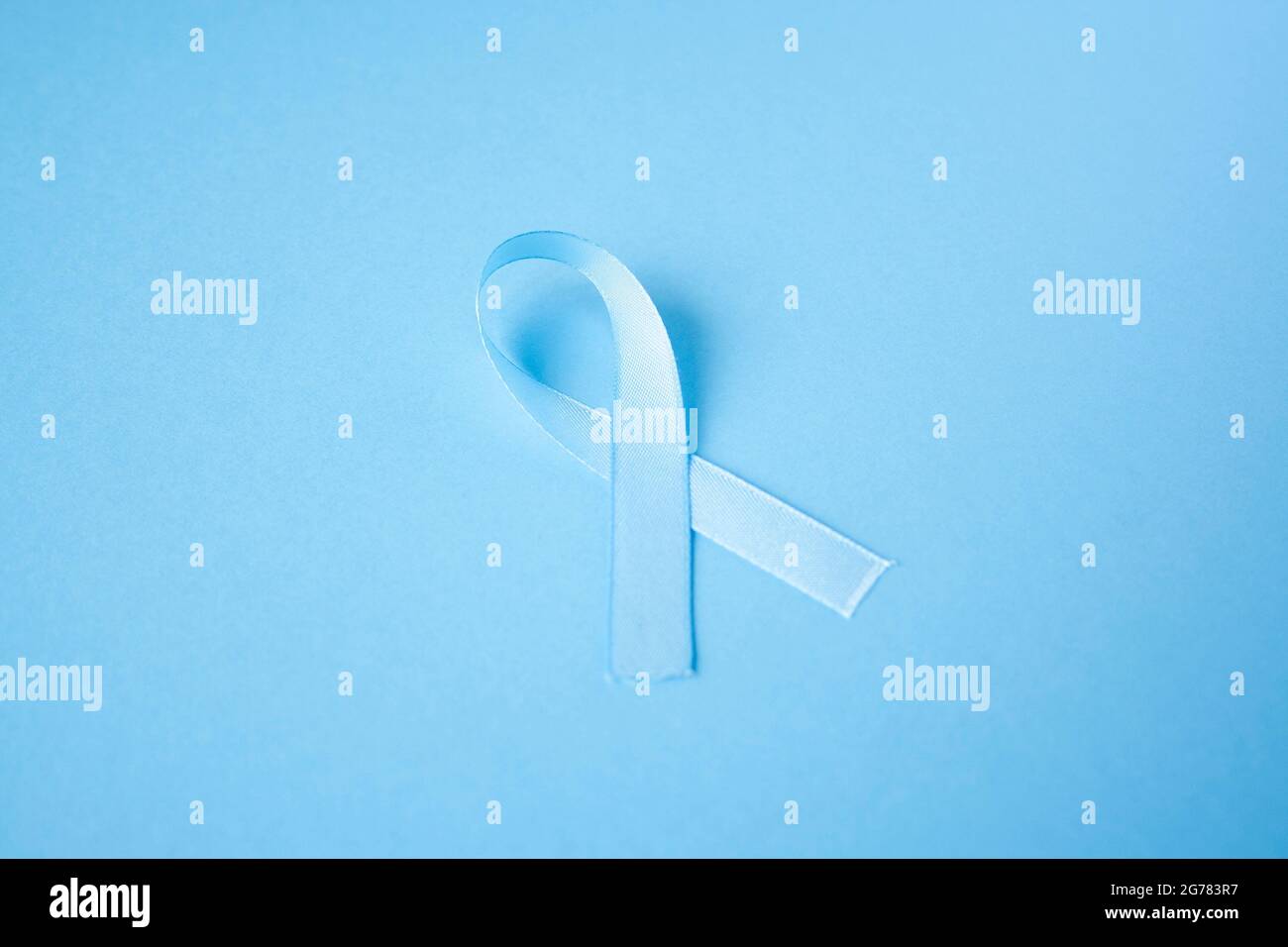 Prostate cancer awareness blue ribbon Stock Photo - Alamy
