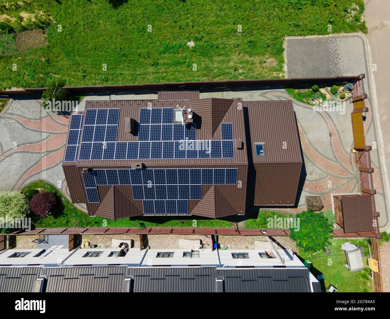 aerial view of house building with solar sun panels clean energy ...