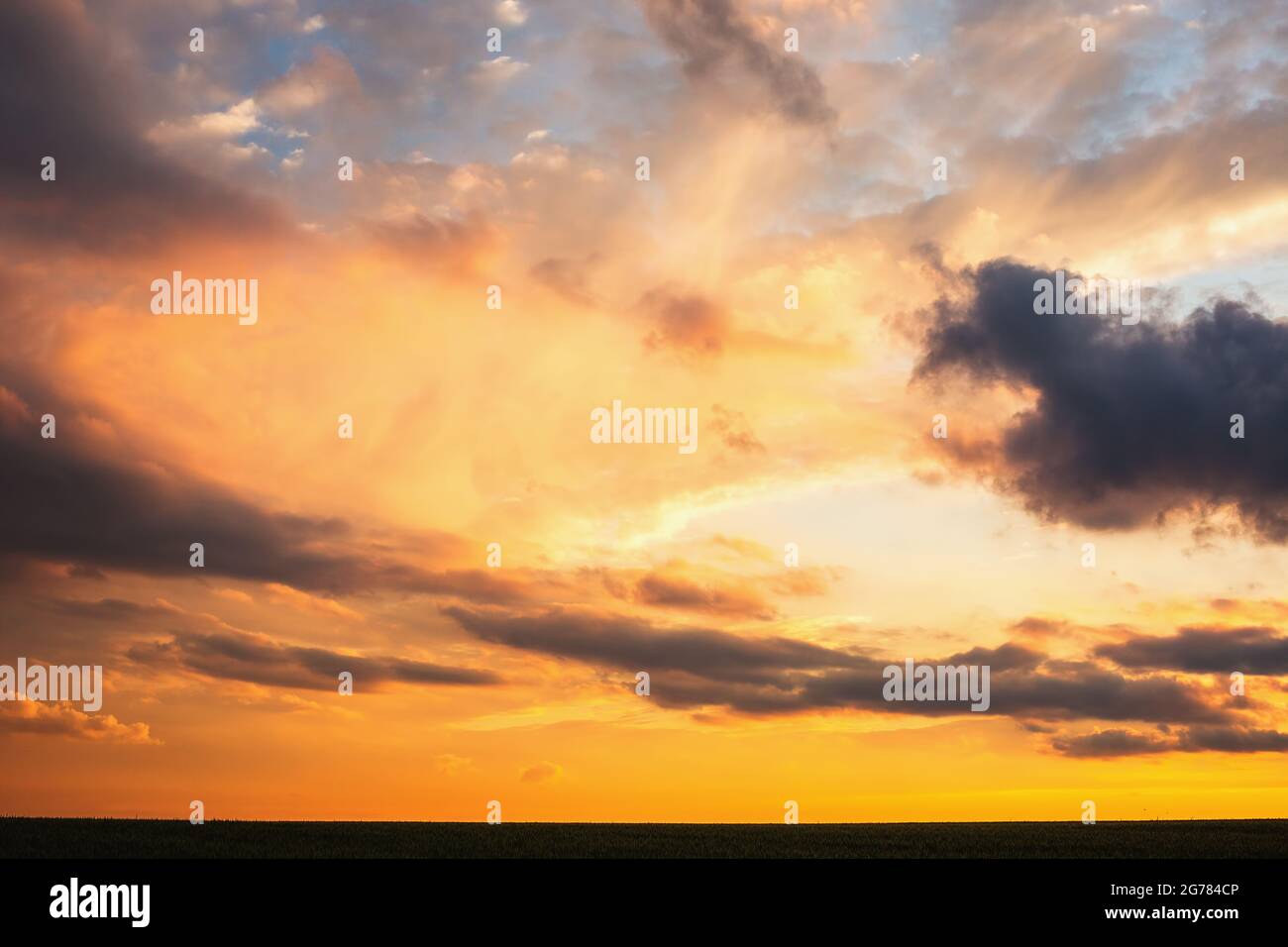 Gold blue sunset sky hi-res stock photography and images - Alamy