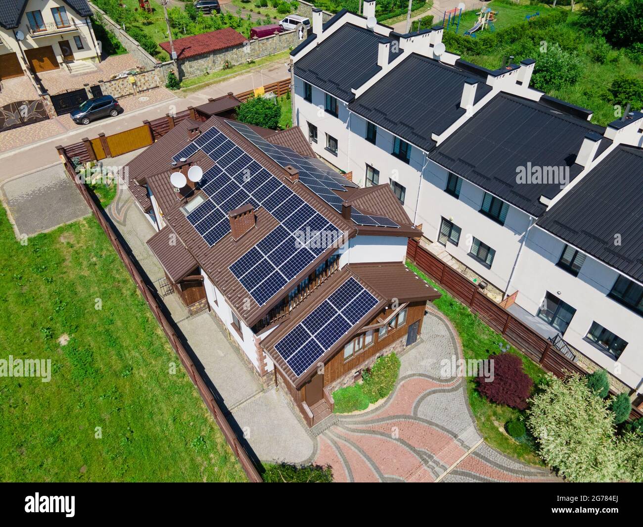 aerial view of house building with solar sun panels clean energy ...