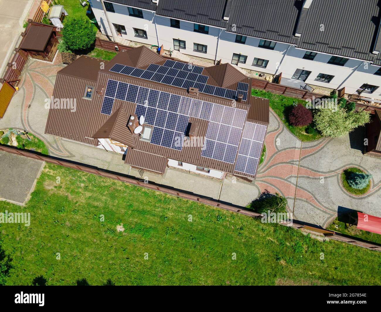 aerial view of house building with solar sun panels clean energy ...