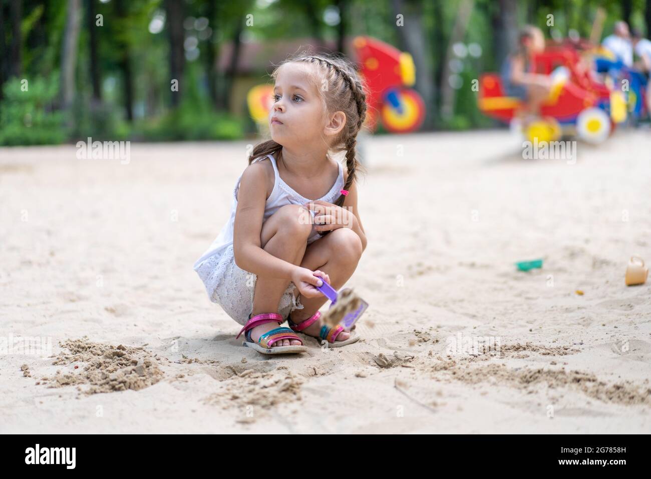 Little Girl Playing Sandbox Playground Digging Sand Shovel Building ...