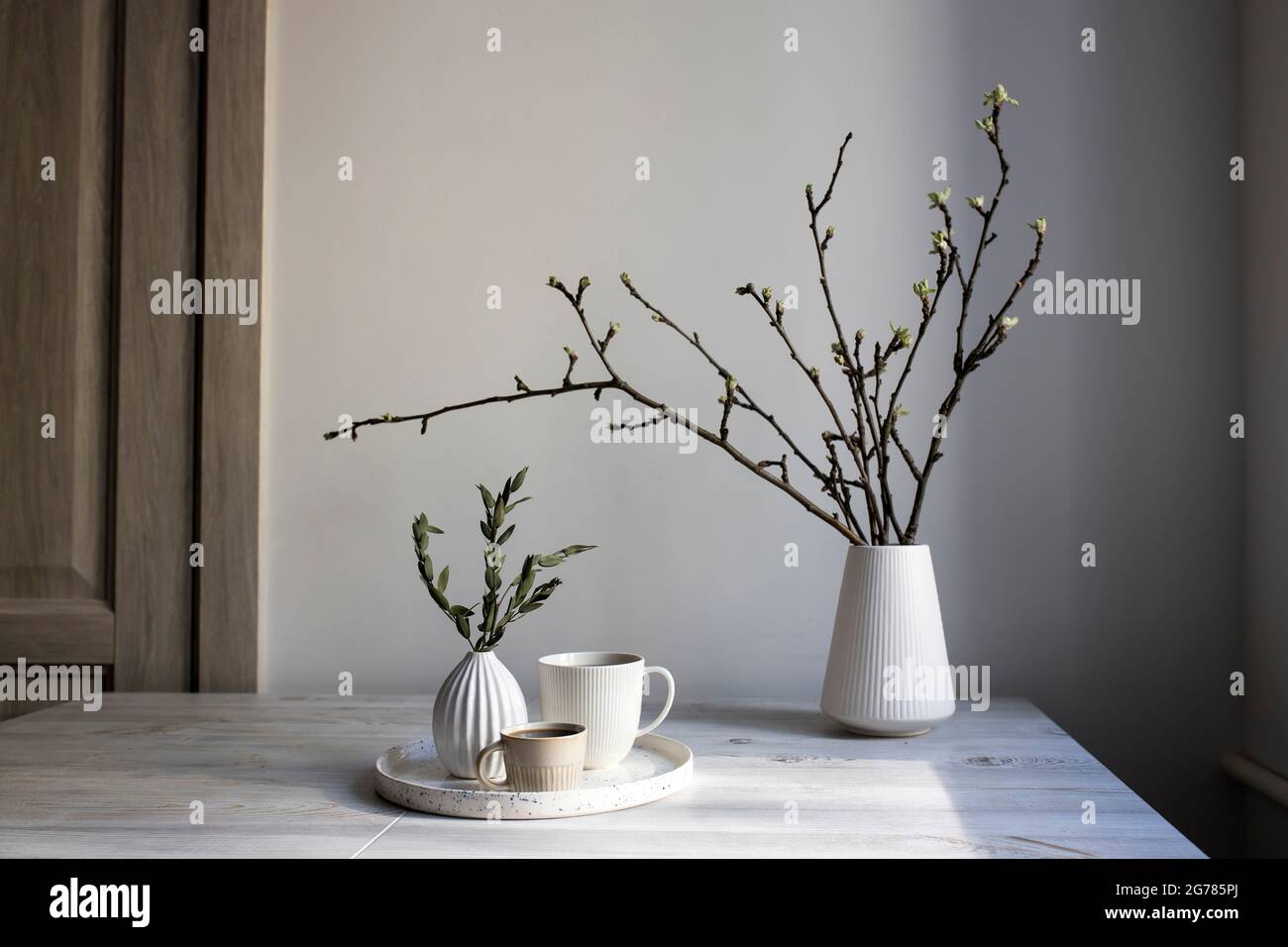Minimalistic Scandinavian style. Half-open branches of an apple tree in ...