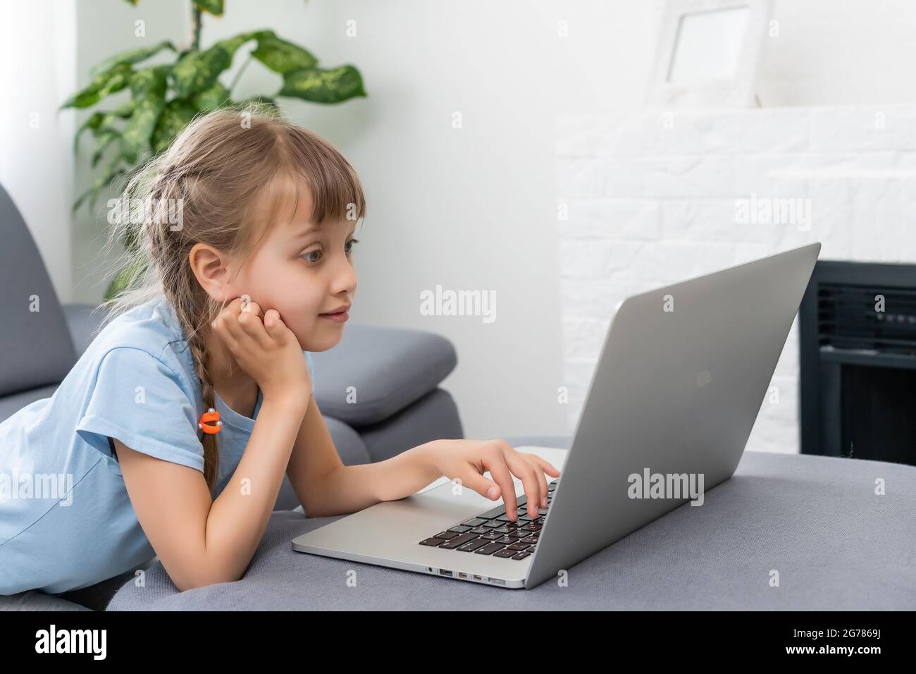 little girl studying with computer, little girl with laptop online ...