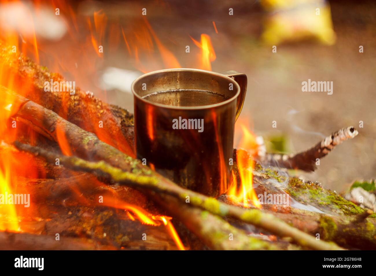 A mug of water is on fire Stock Photo - Alamy