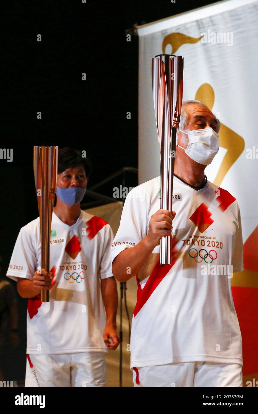 Tokyo, Japan. 12th July, 2021. Torchbearers attend a Tokyo 2020 Olympic ...