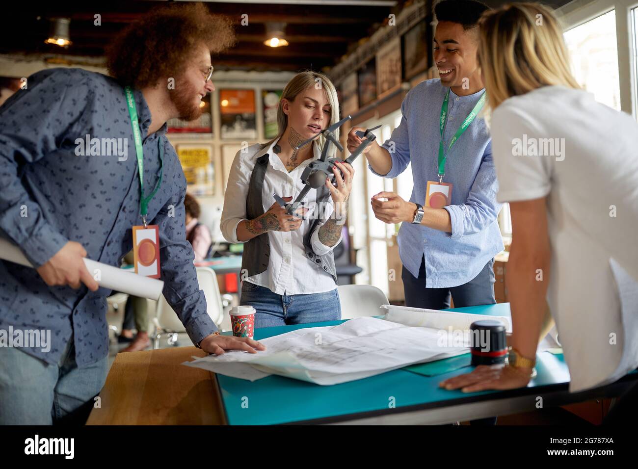 A group of young creative colleagues in a working atmosphere in the ...