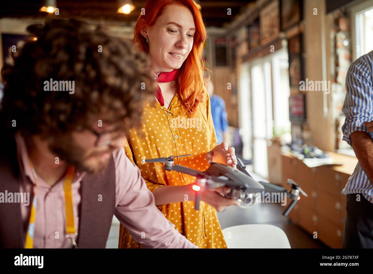 A group of young creative colleagues in a working atmosphere in the ...