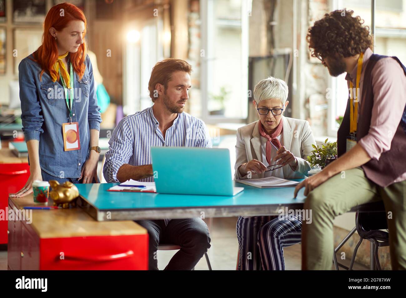 Business colleagues reviewing documents hi-res stock photography and ...