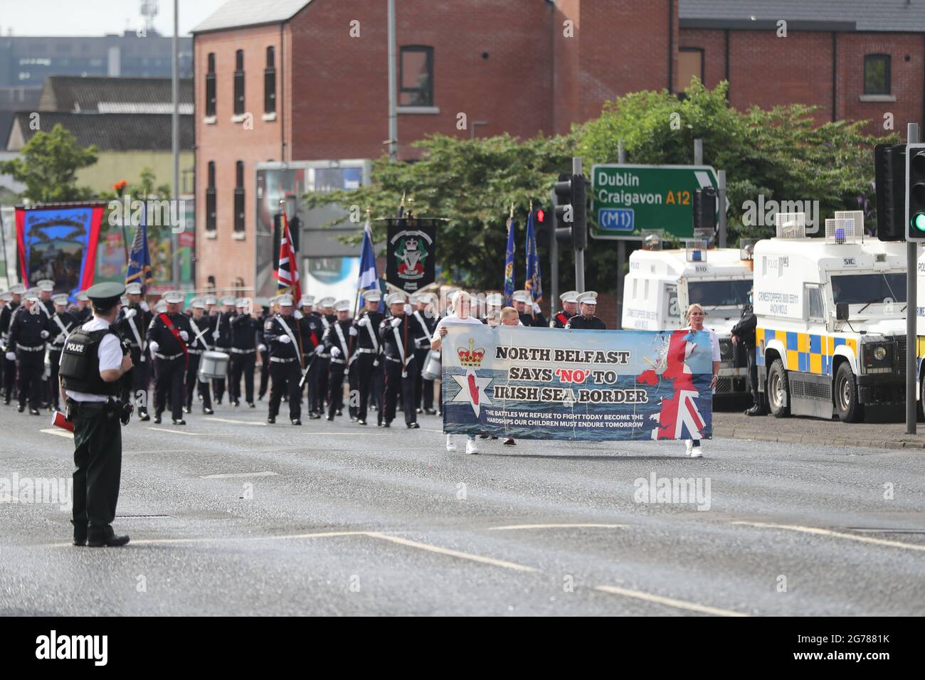 Orangemen march in the Clifton Street area of Belfast as part of the ...