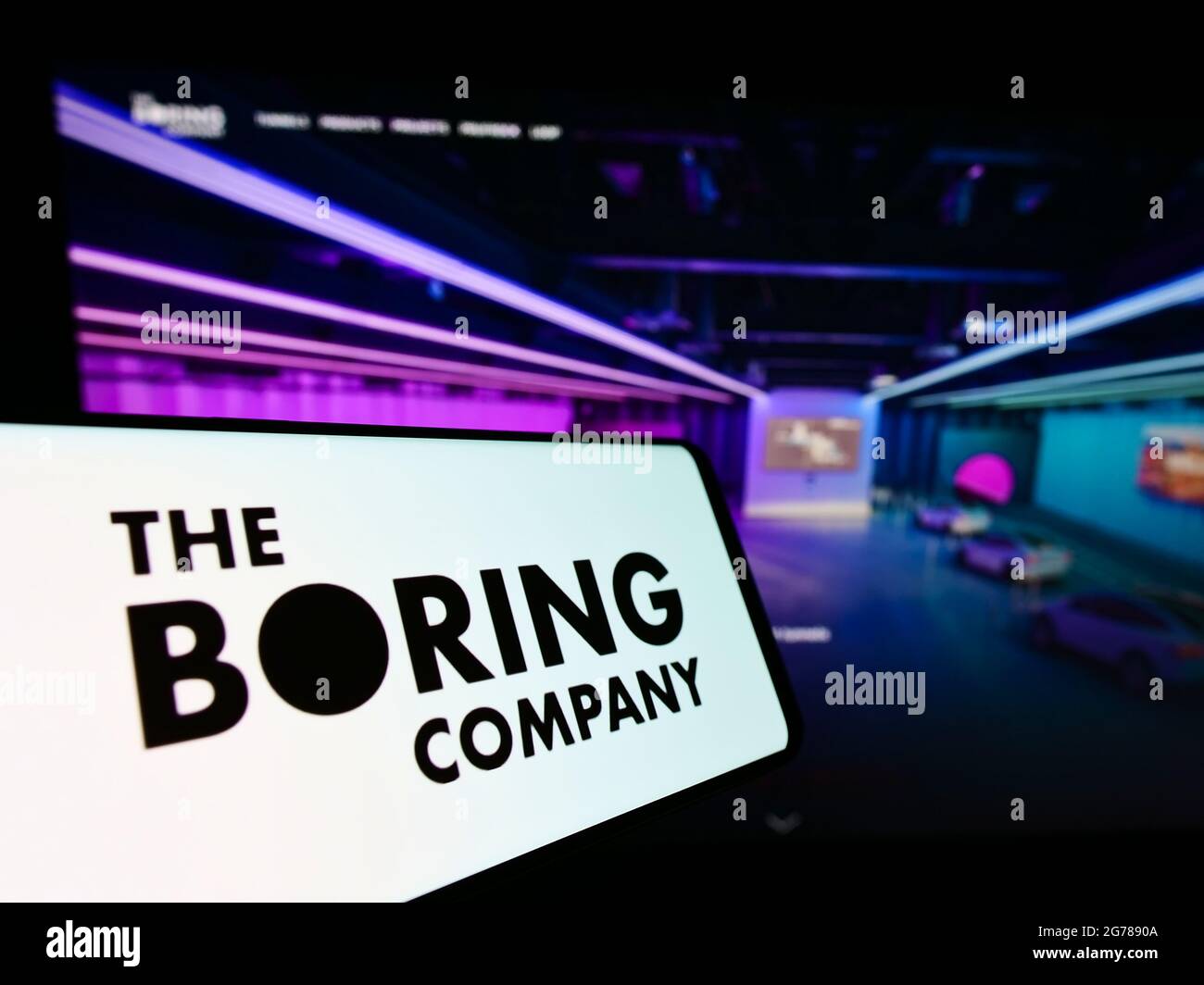 Mobile phone with logo of US tunnel company The Boring Company (TBC) on ...