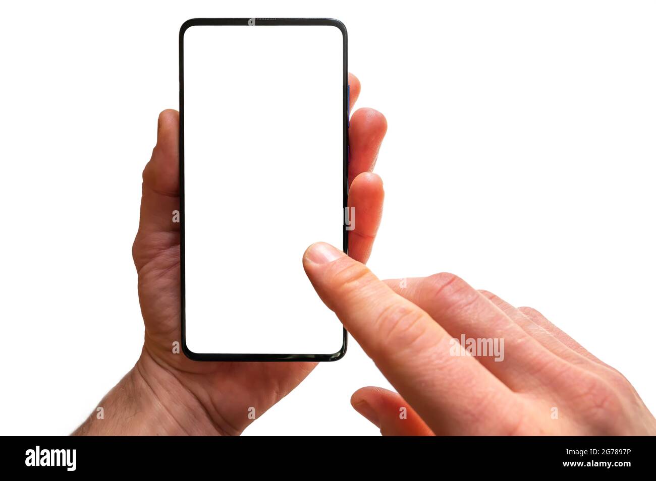 A man's hand uses an empty touch display of a modern smartphone as a ...