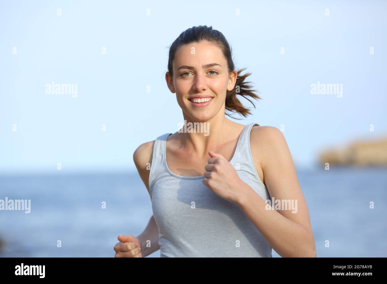 Woman running towards camera hi-res stock photography and images - Alamy