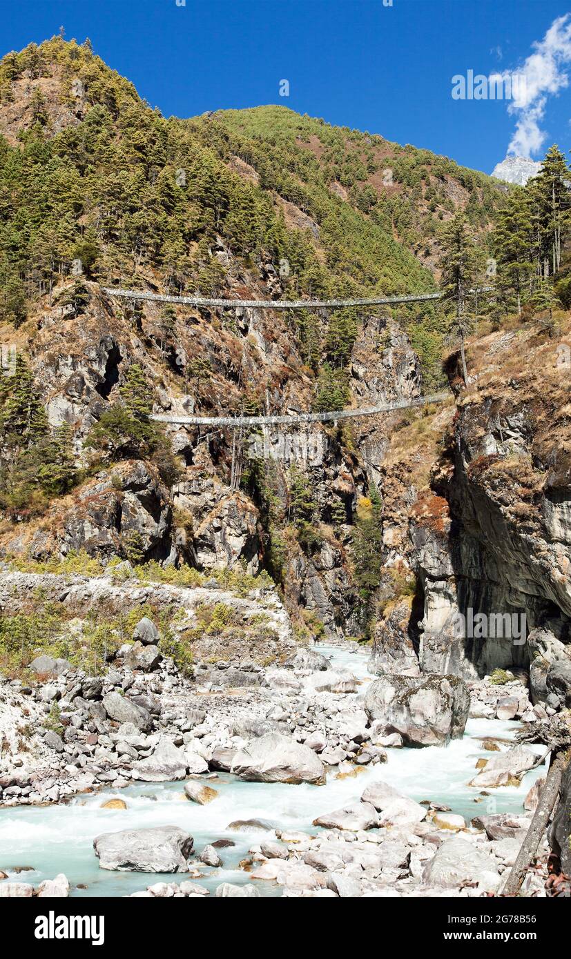 Two rope hanging suspension bridges in Nepal Himalayas under Namche ...