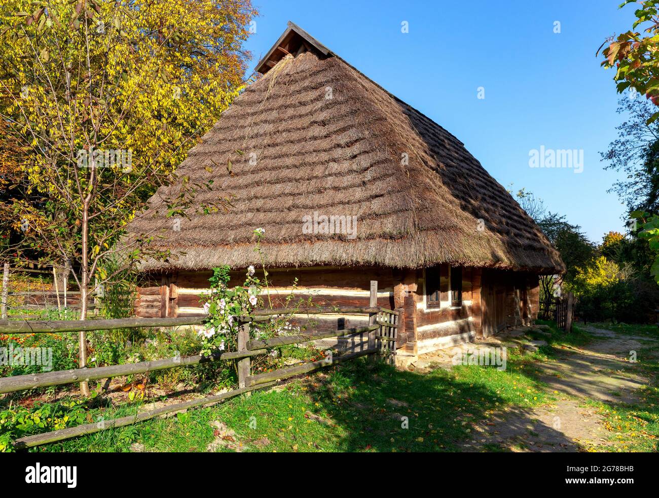 Traditional wooden old village house with a triangular roof ...