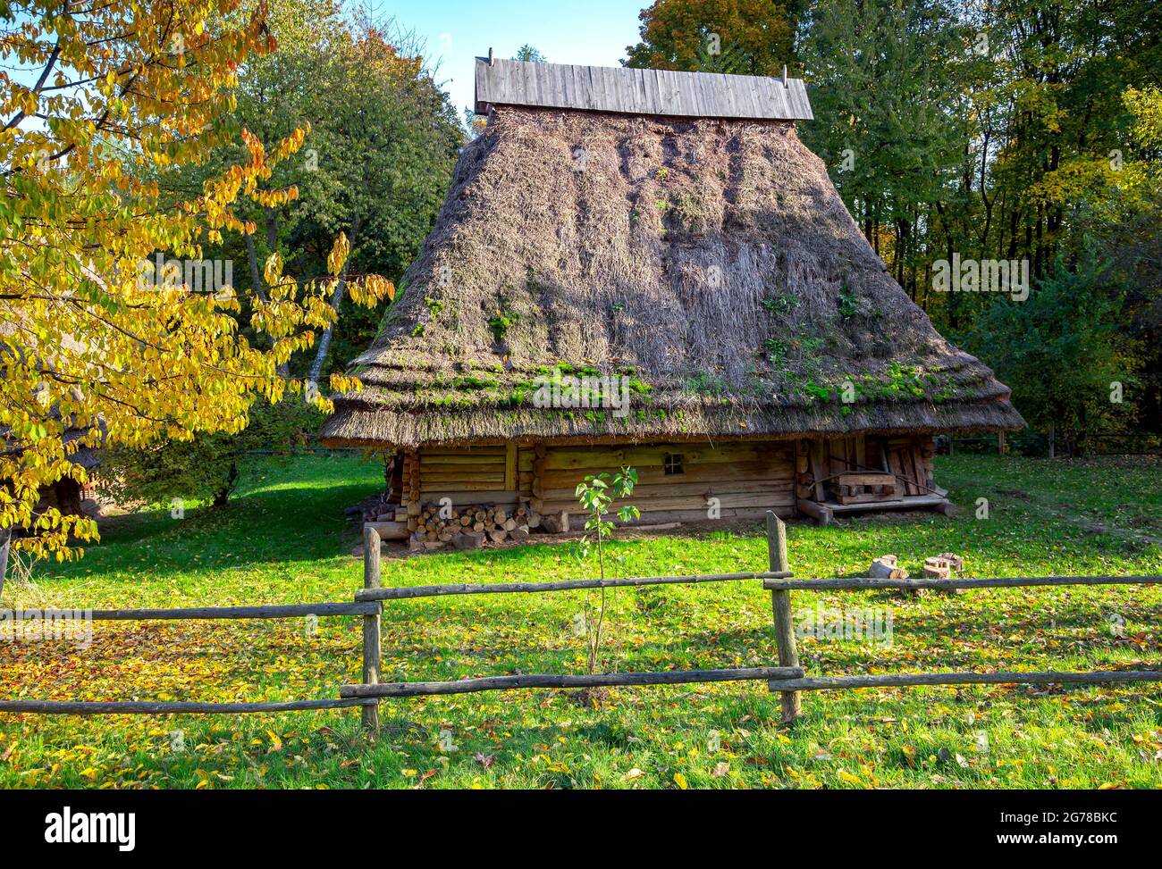 Traditional wooden old village house with a triangular roof ...