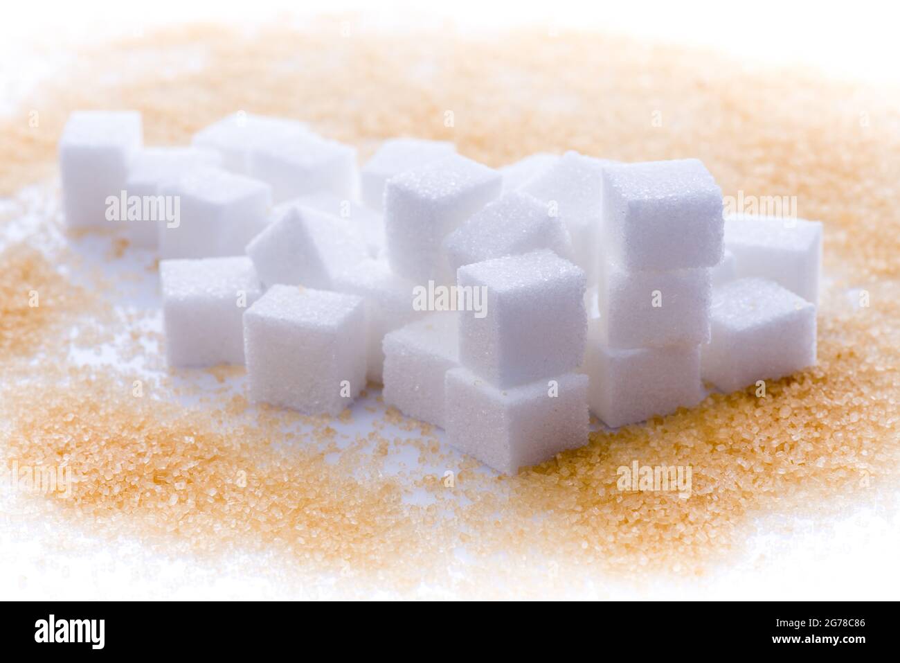 White sugar cubes surrounded by sugar cane Stock Photo - Alamy