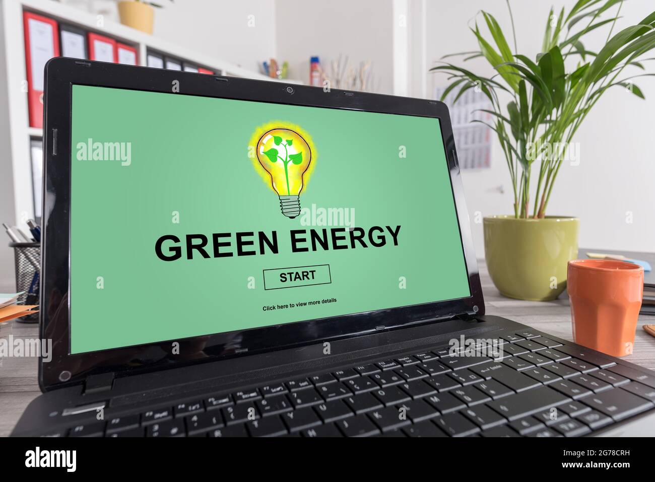 Laptop screen with green energy concept Stock Photo - Alamy