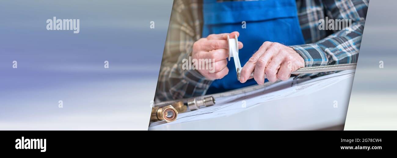 Plumber's hands putting teflon tape on a thread of a plumbing fitting ...