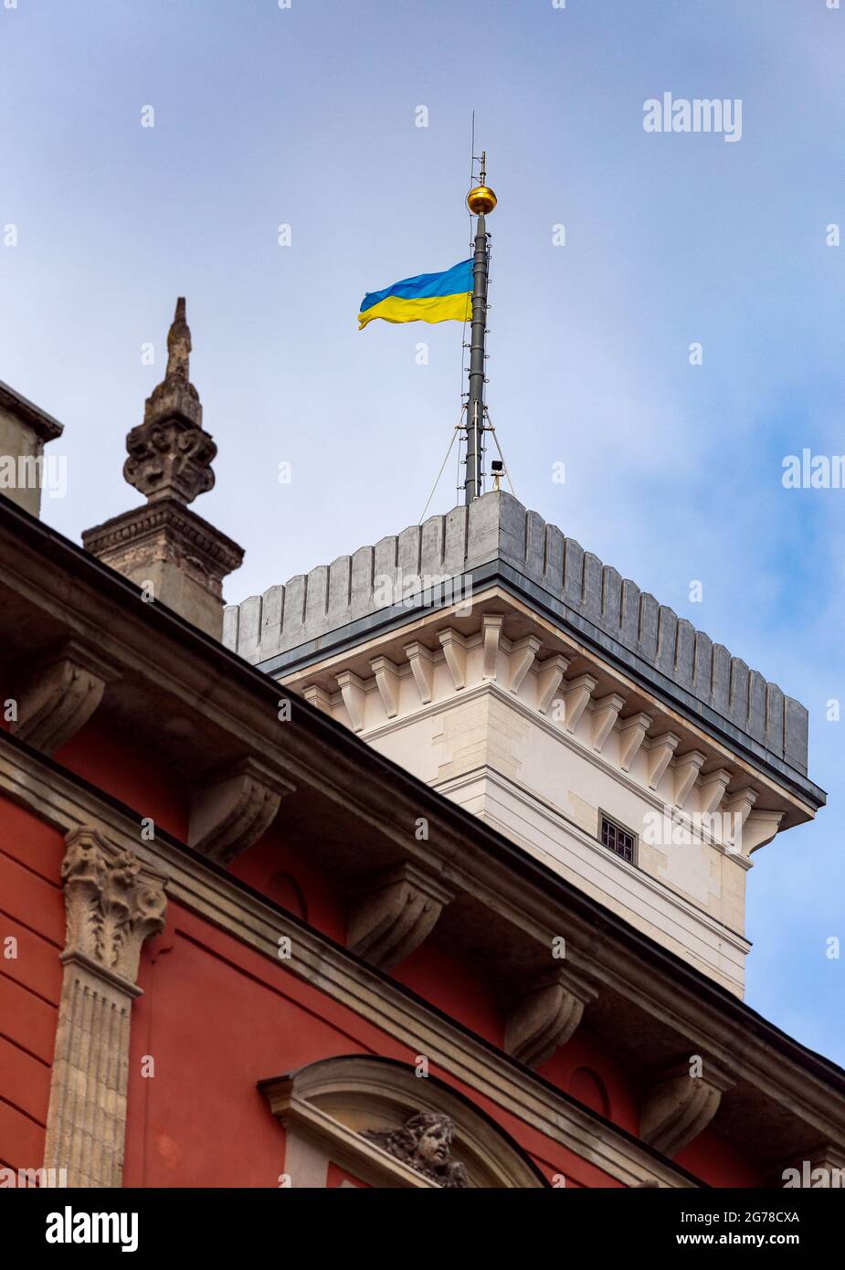 Facade with balconies and flag hi-res stock photography and images - Alamy