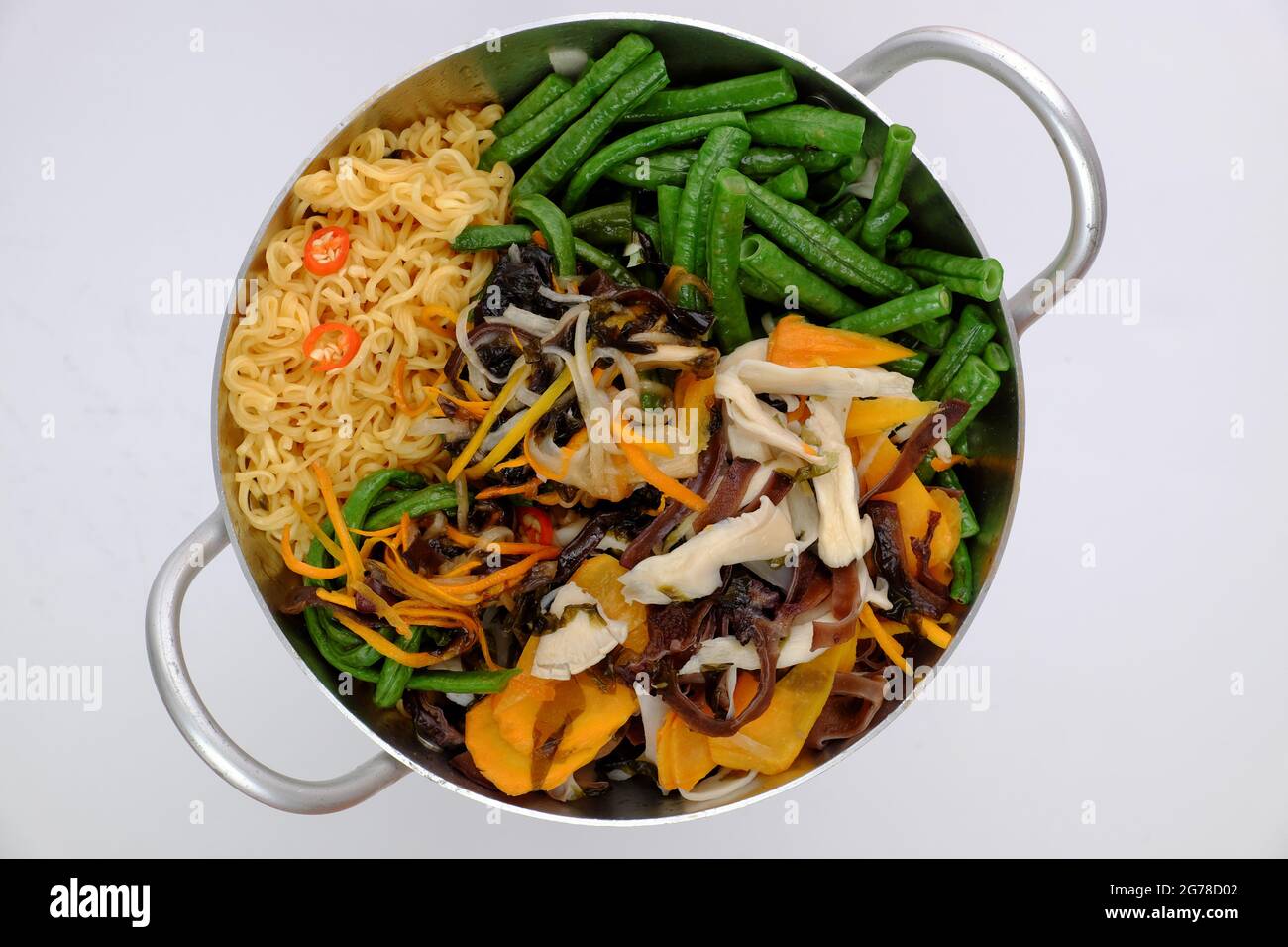Prepare, mix to make vegan instant noodles with vegetables, raw ...