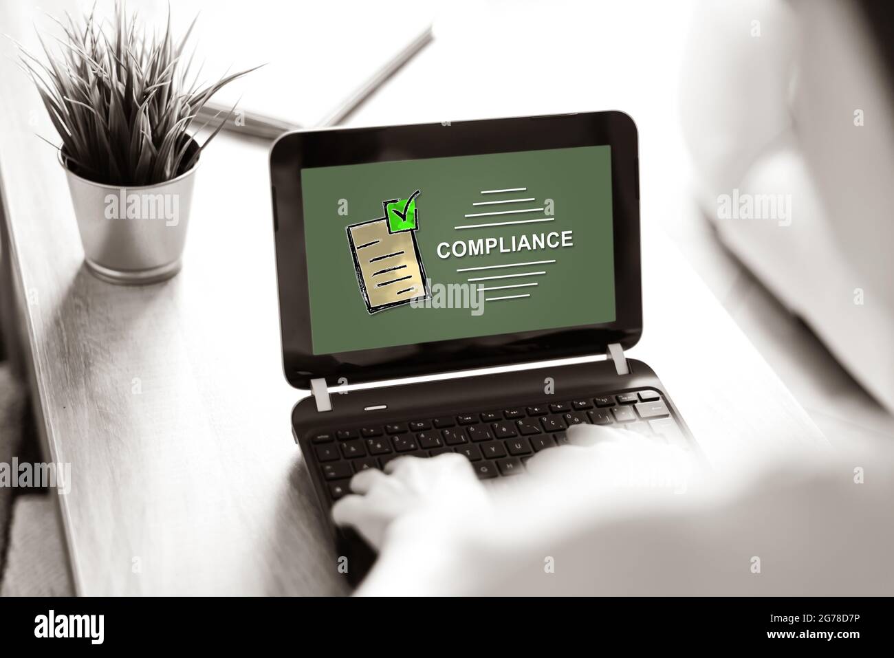 Laptop screen displaying a compliance concept Stock Photo - Alamy