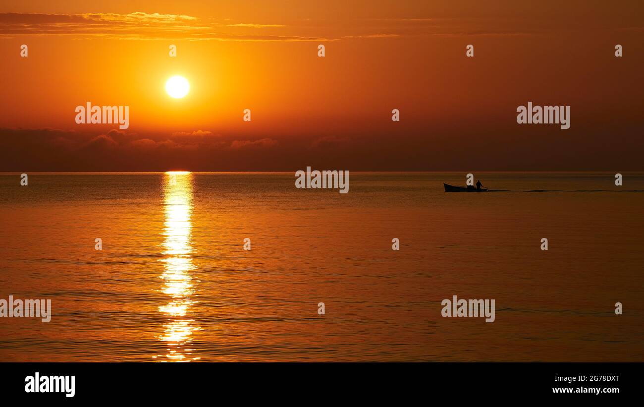 Sun rises in the top left of the picture hi-res stock photography and ...