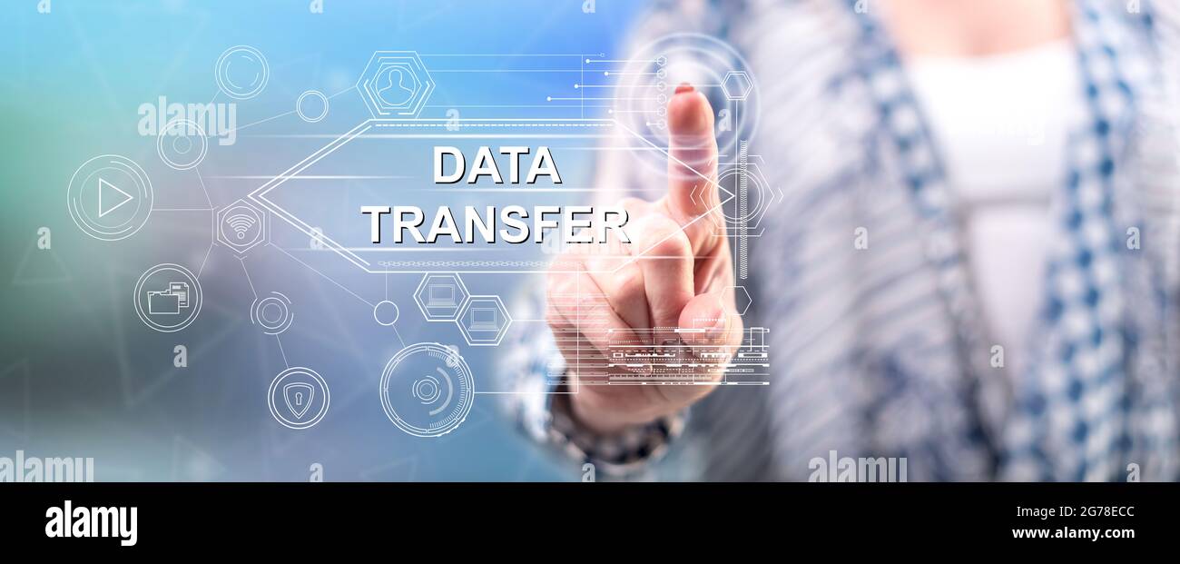 Woman touching a data transfer concept on a touch screen with her ...