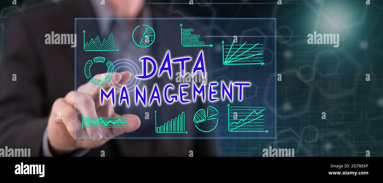 Man touching a data management concept on a touch screen with his ...