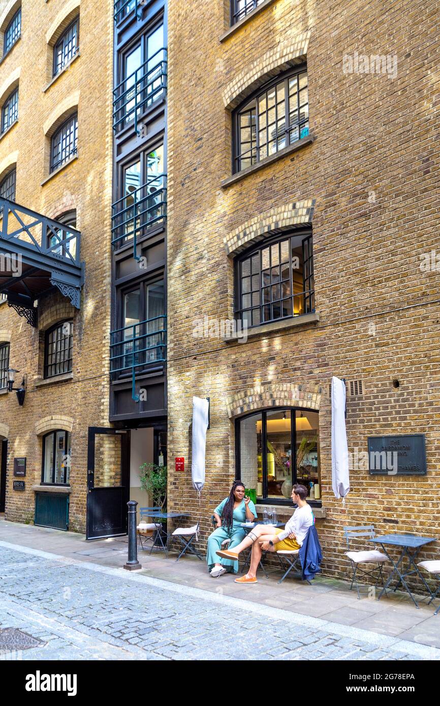 People sitting outside Legare Italian restaurant in Shad Thames, London ...