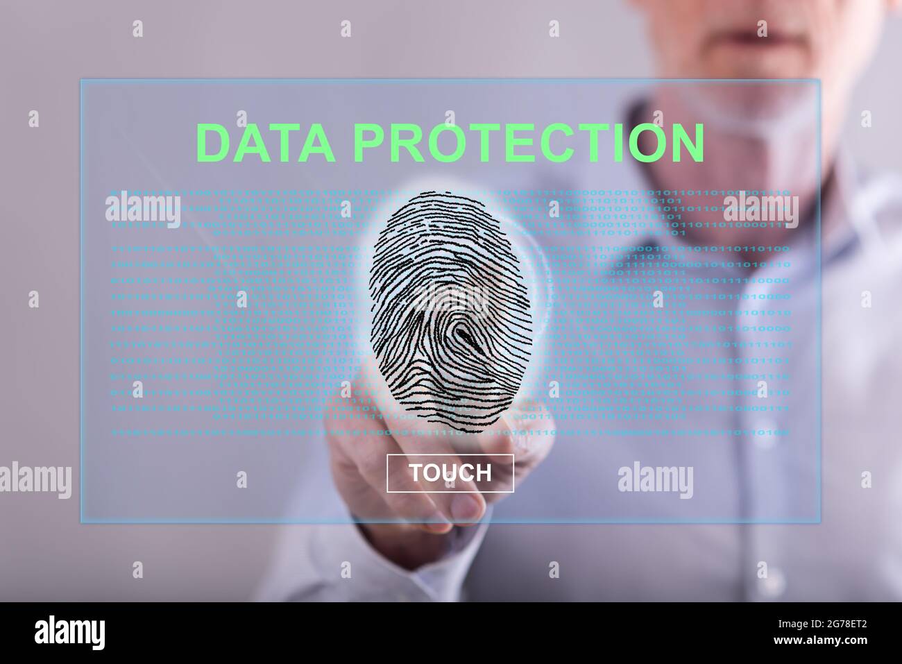 Man touching a data protection concept on a touch screen with his ...