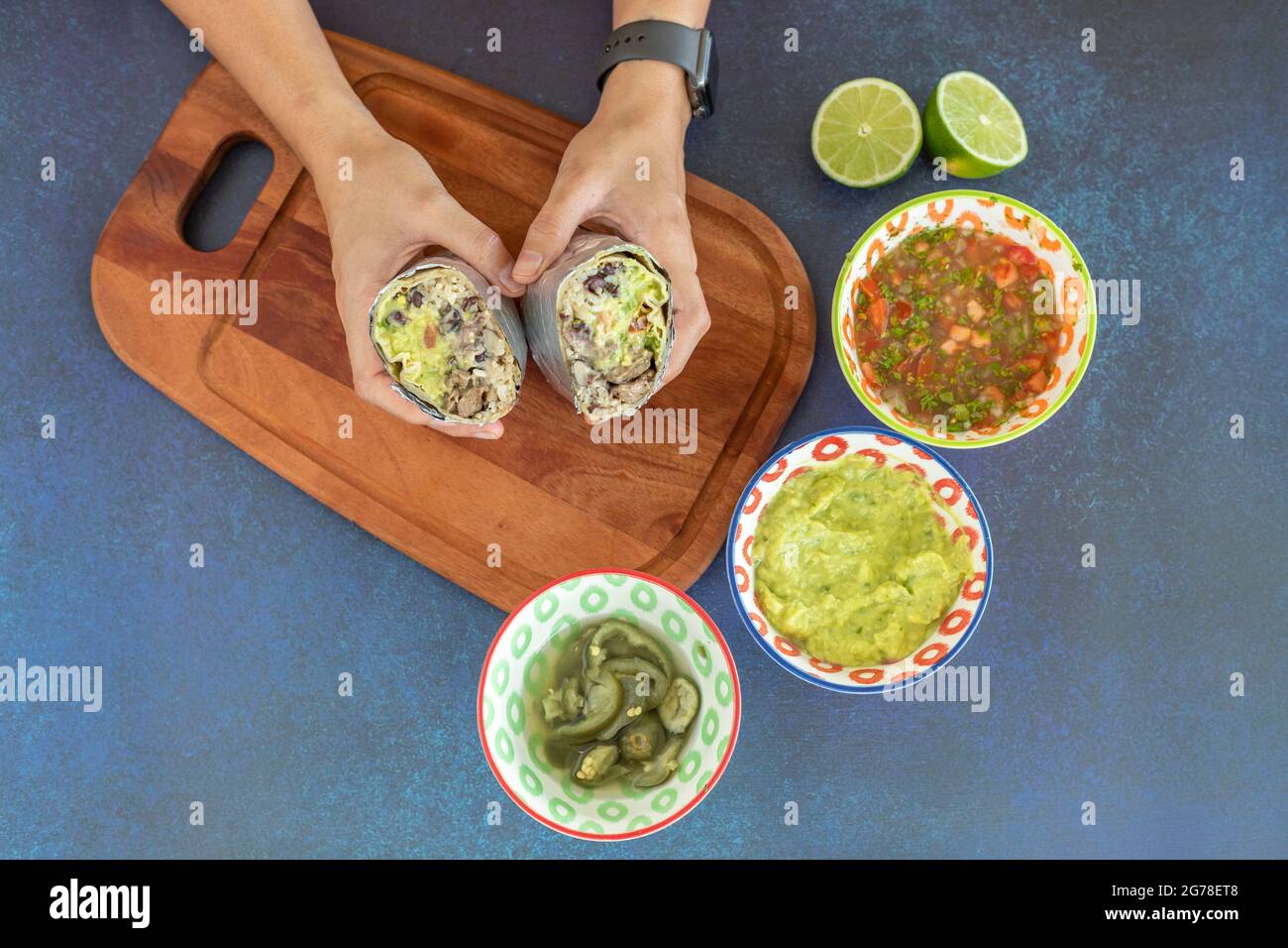 Mexican eating burrito hi-res stock photography and images - Alamy