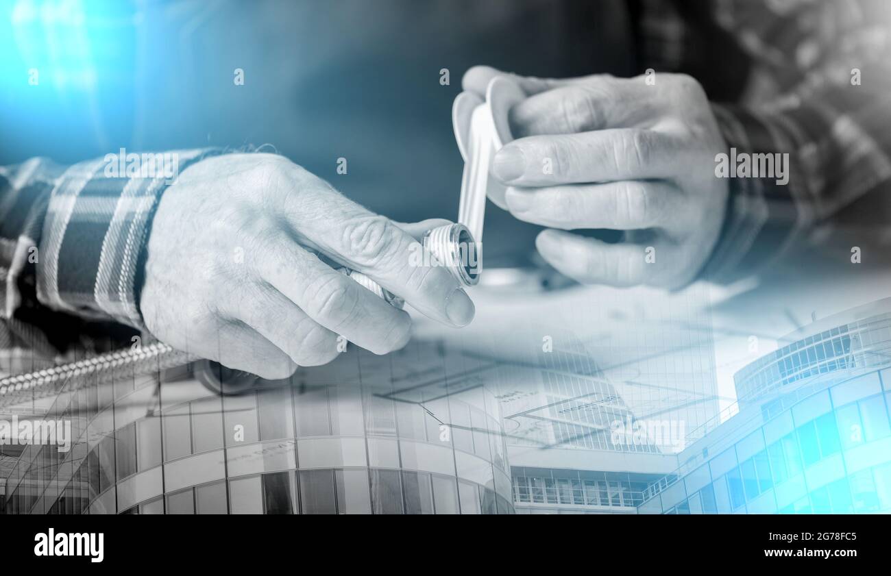 Plumber's hands putting thread seal tape on a thread of a plumbing ...