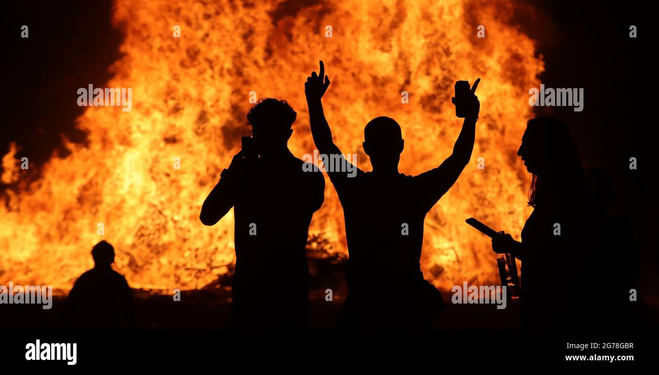 The huge bonfire in Craigyhill, Larne, is lit on the "Eleventh night ...