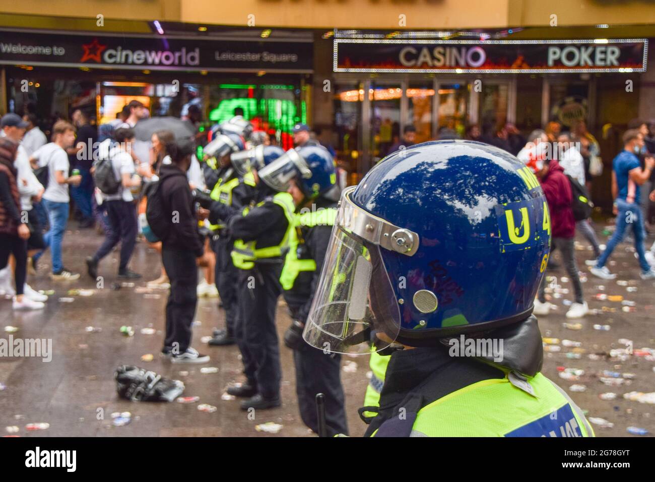 London, United Kingdom. 11th July 2021. Riot police observe unruly ...