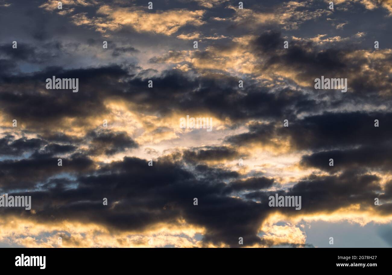 dramatic sunset summer many clouds dark Stock Photo - Alamy