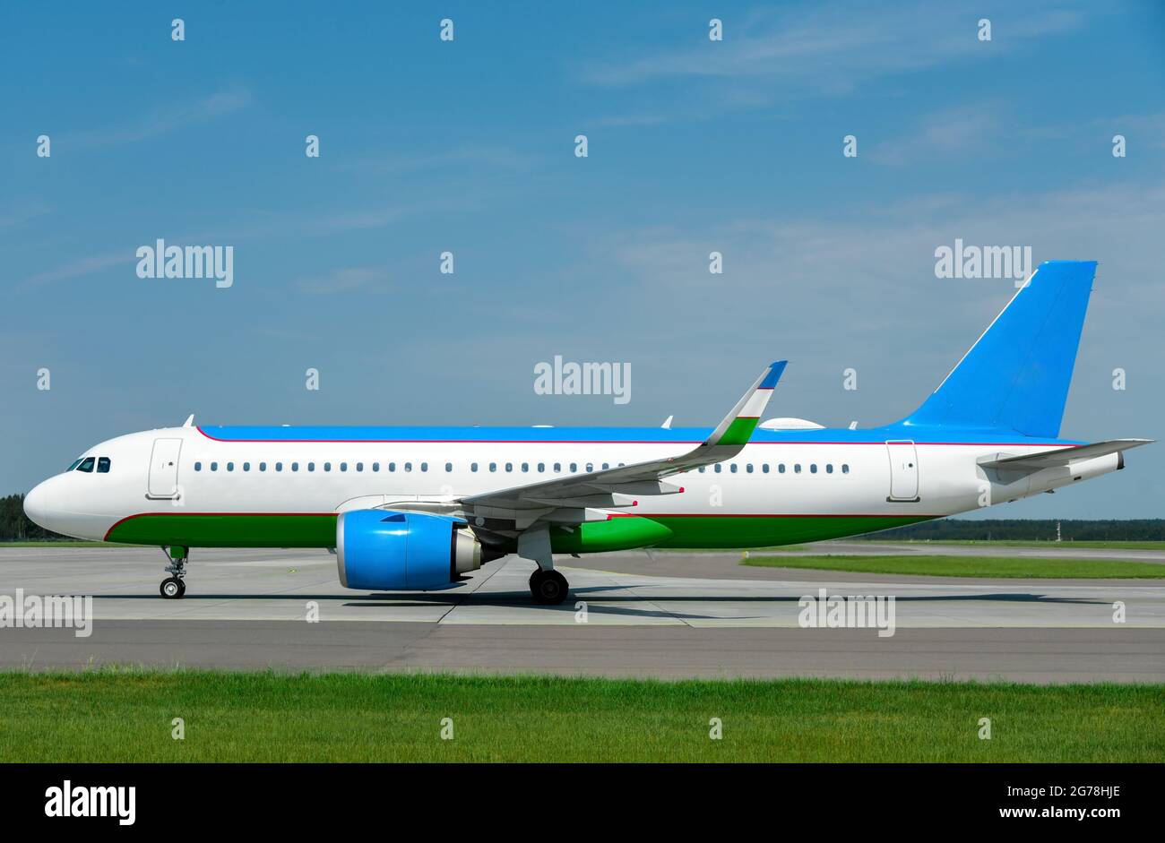 Passenger plane on the runway at the airport, side view Stock Photo - Alamy